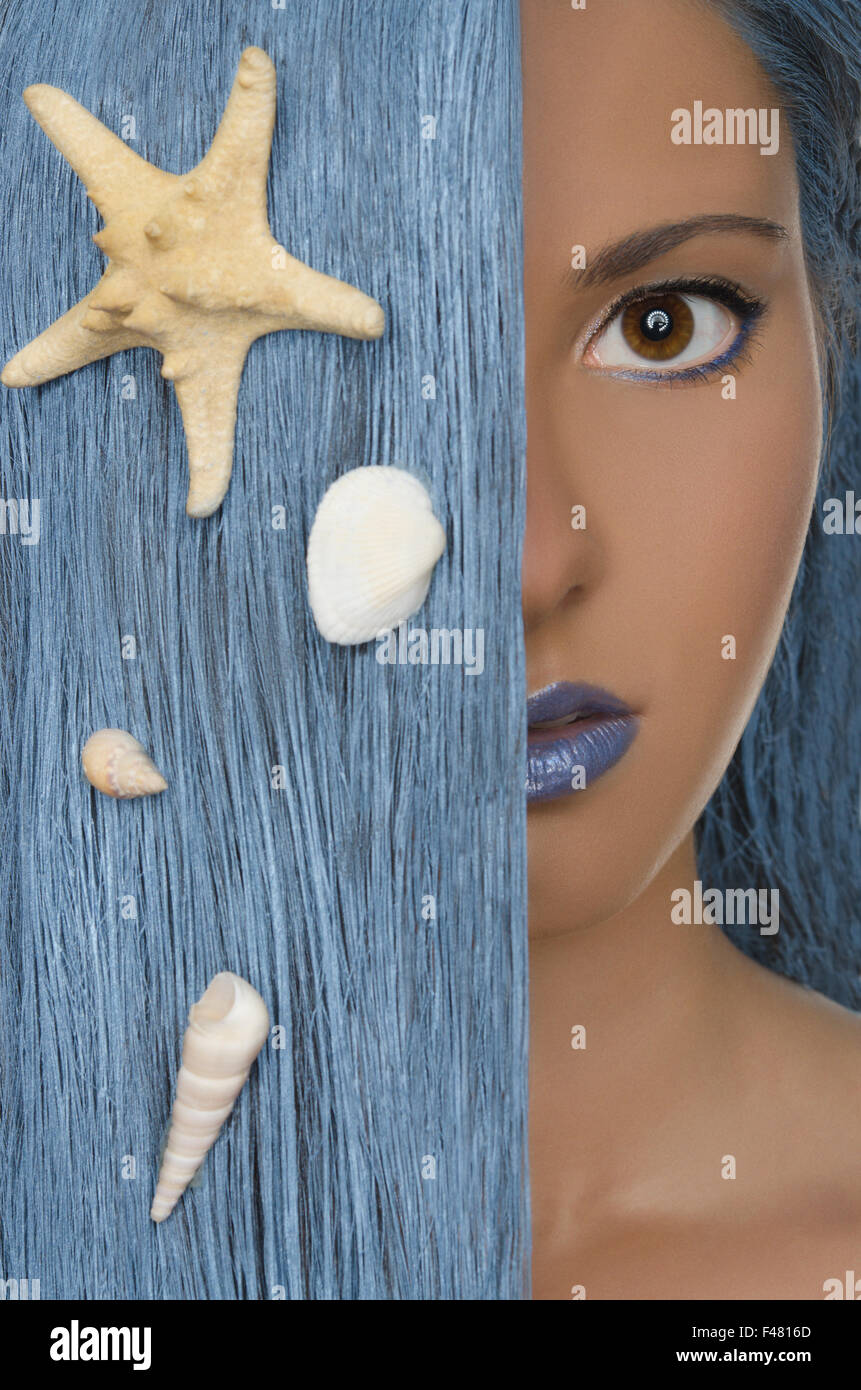 Woman shells hi-res stock photography and images - Alamy