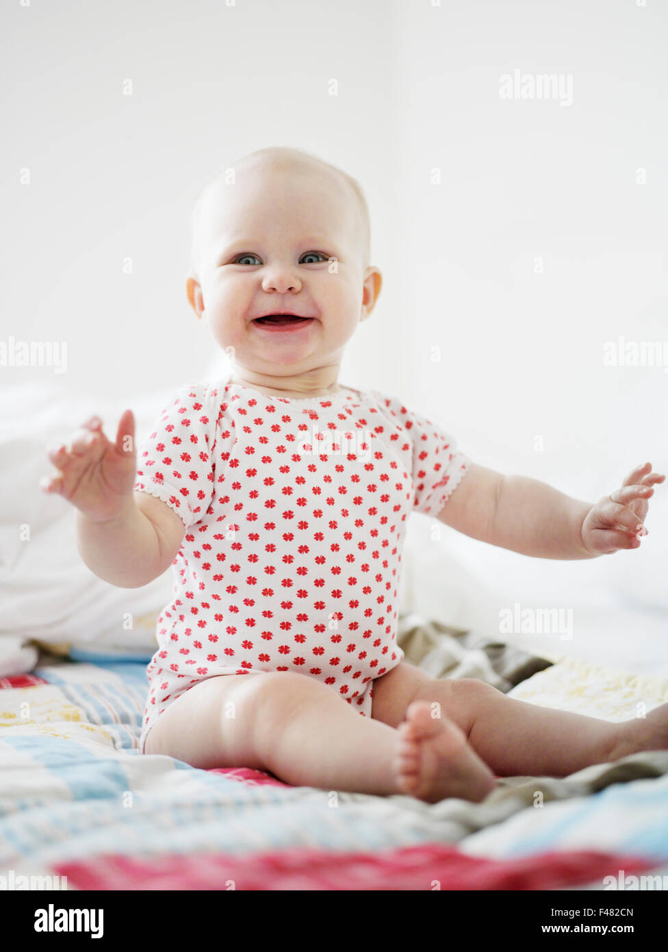 A baby girl laughing, Sweden Stock Photo - Alamy
