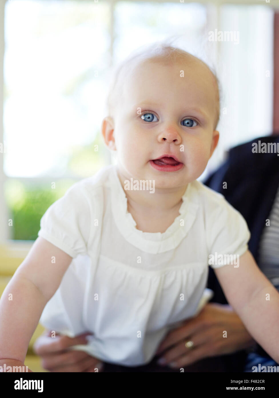 A happy baby girl, Sweden Stock Photo - Alamy