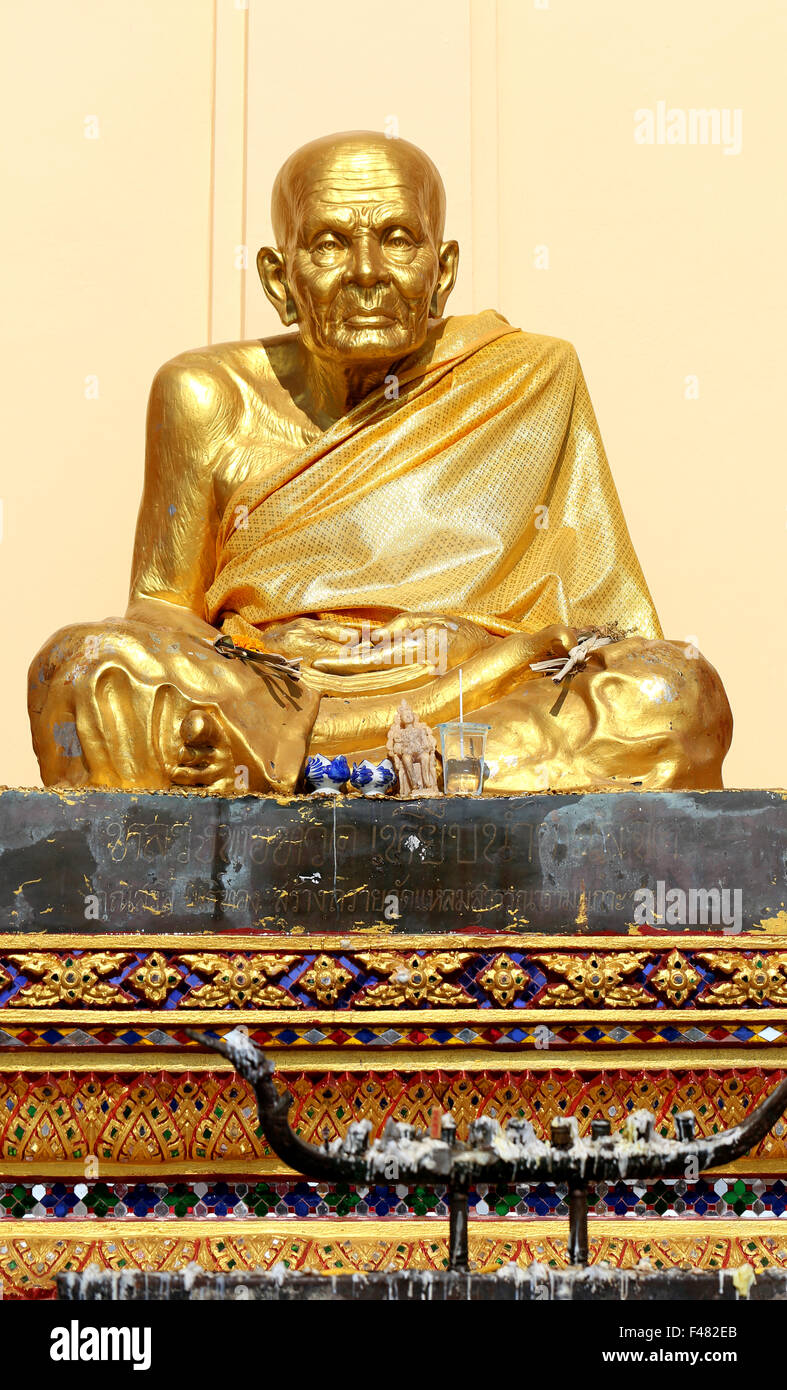 Statue of a Buddhist monk sitting in the Lotus position Stock Photo - Alamy