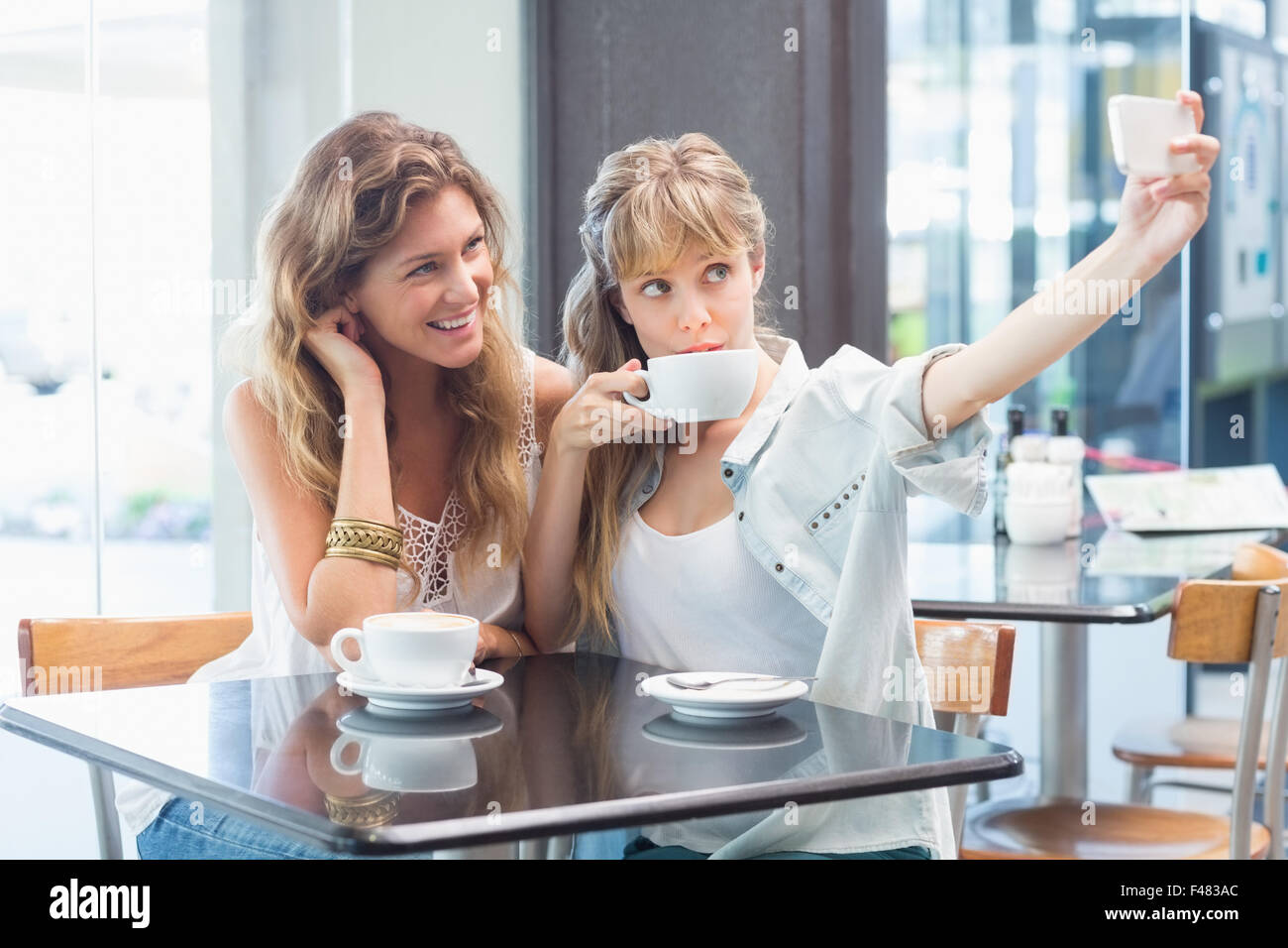 Women making coffee hi-res stock photography and images - Alamy