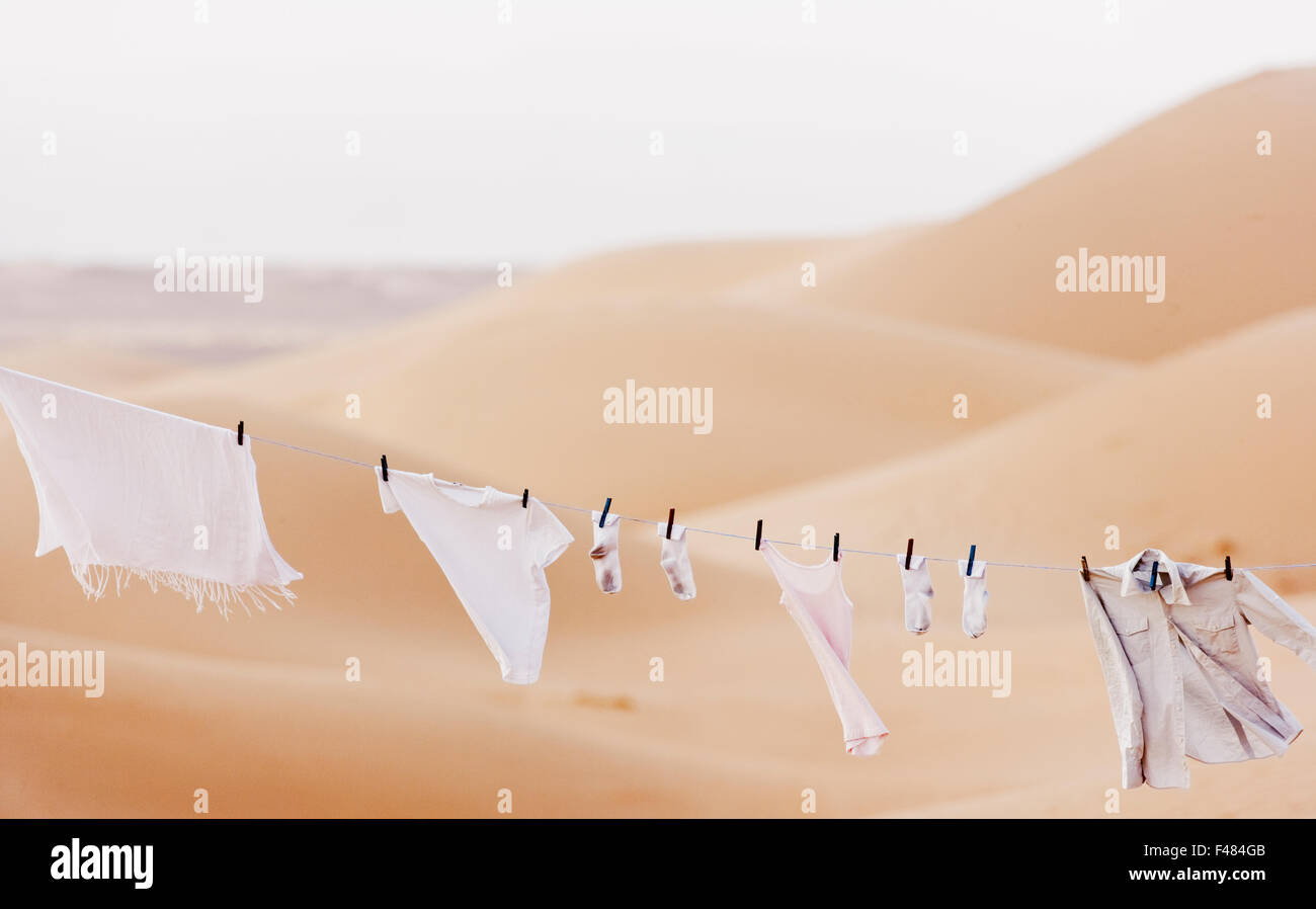 Laundry on clothes line in the desert, Morocco Stock Photo - Alamy
