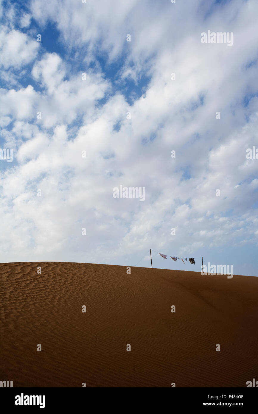 Laundry on clothes line in the desert, Morocco Stock Photo - Alamy
