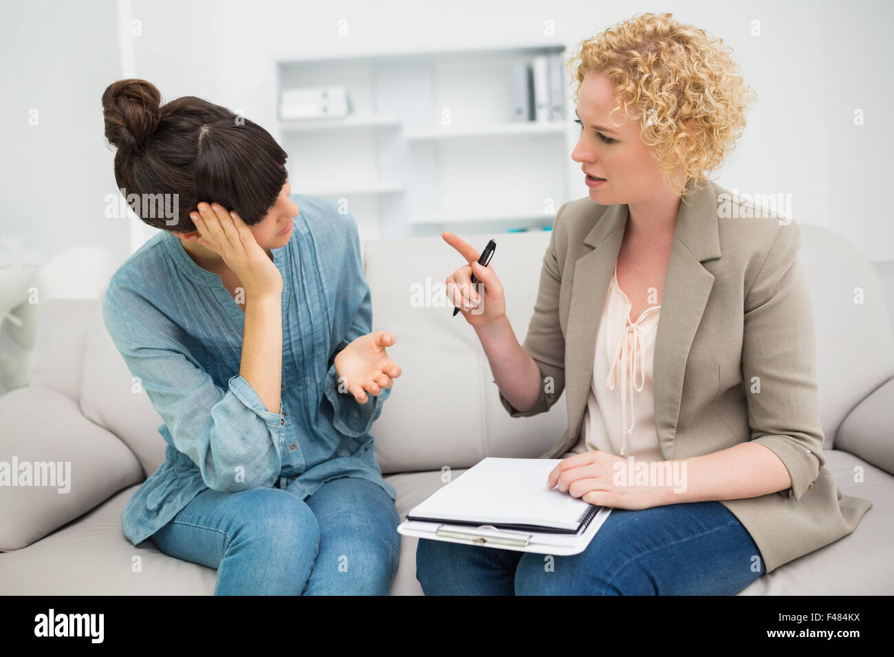 businesswoman comforting her colleague Stock Photo - Alamy