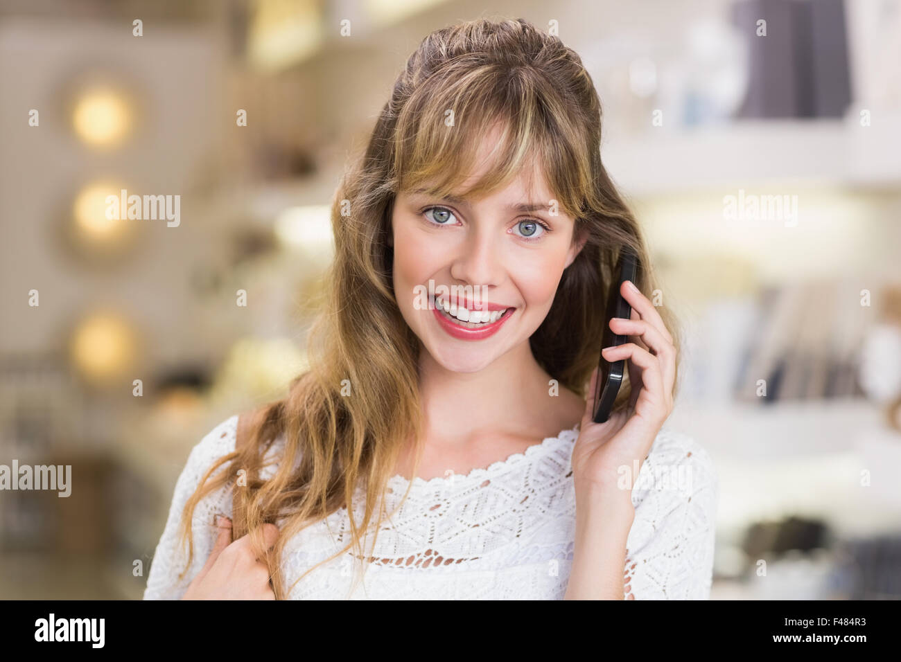 Beautiful woman having a phone call Stock Photo - Alamy