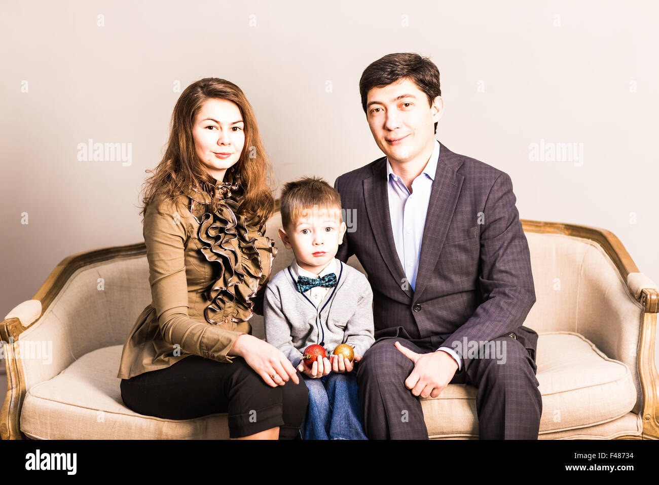 Portrait of a happy family smiling at home Stock Photo - Alamy