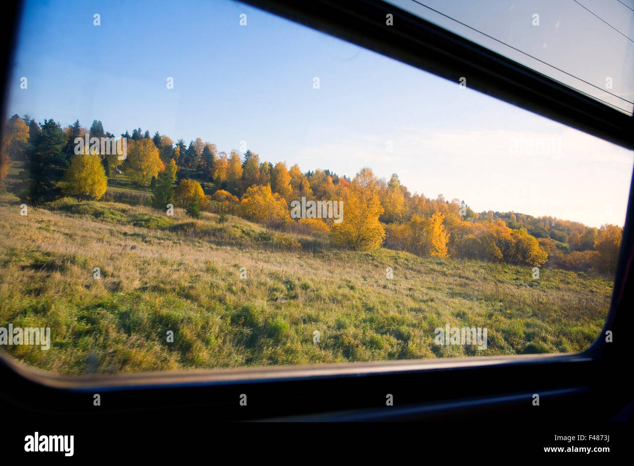 Autumnal scenery seen through the window of a train, Sweden Stock Photo ...