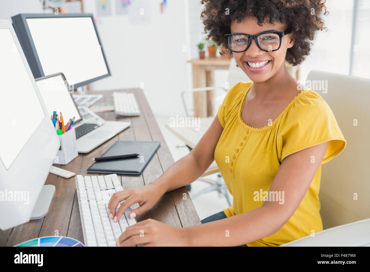 Graphic designer using a computer Stock Photo - Alamy