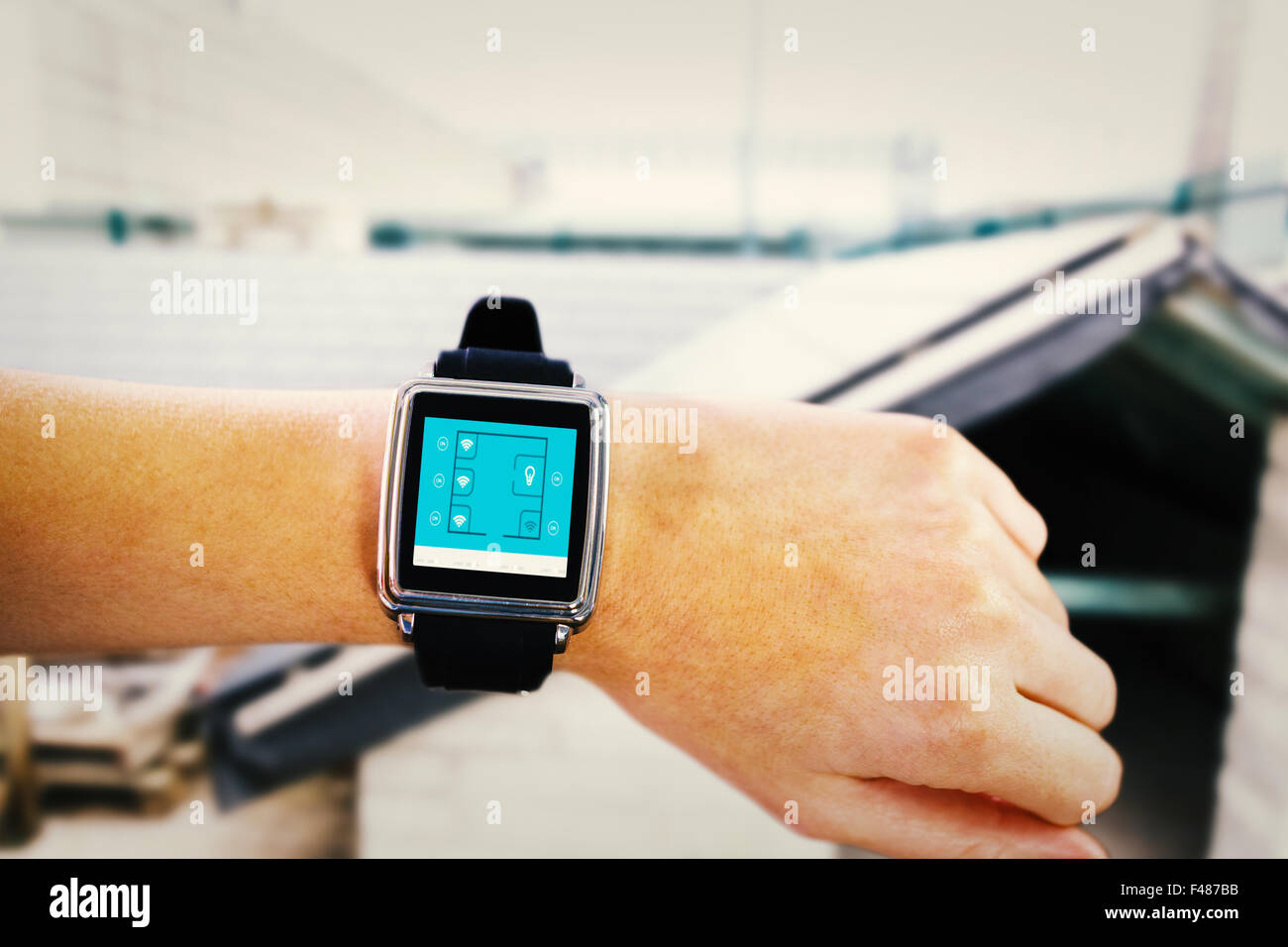 Composite image of smartwatch on wrist Stock Photo - Alamy