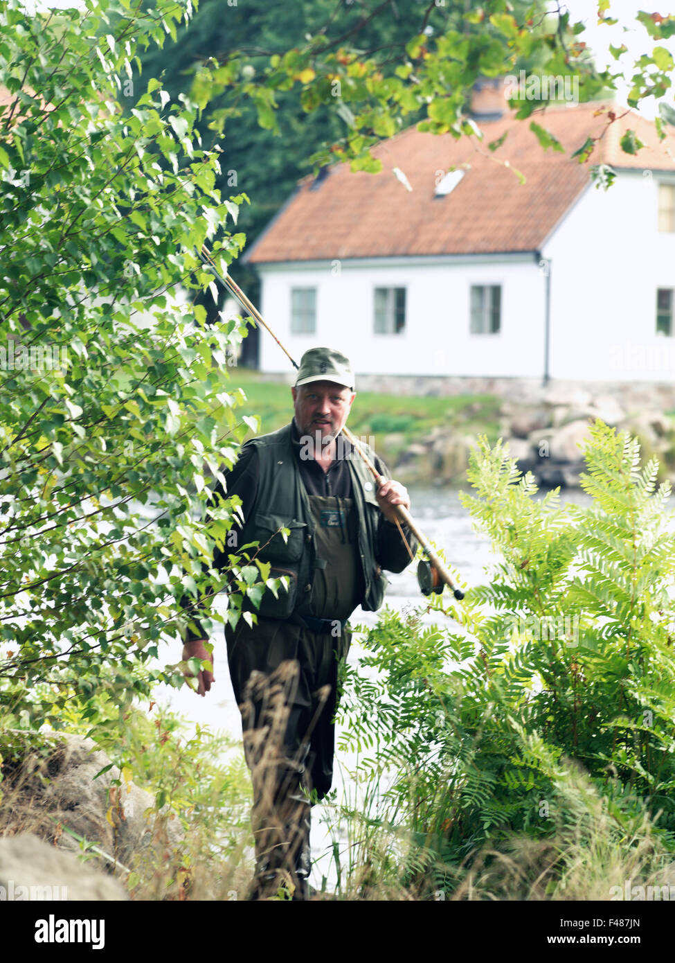 Portrait of an angler, Sweden Stock Photo - Alamy