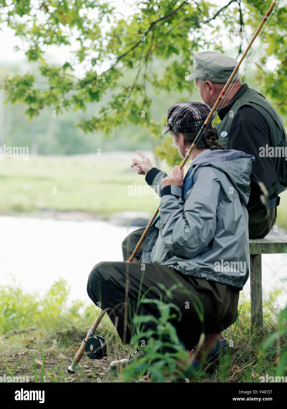 Men fishing waters edge hi-res stock photography and images - Alamy
