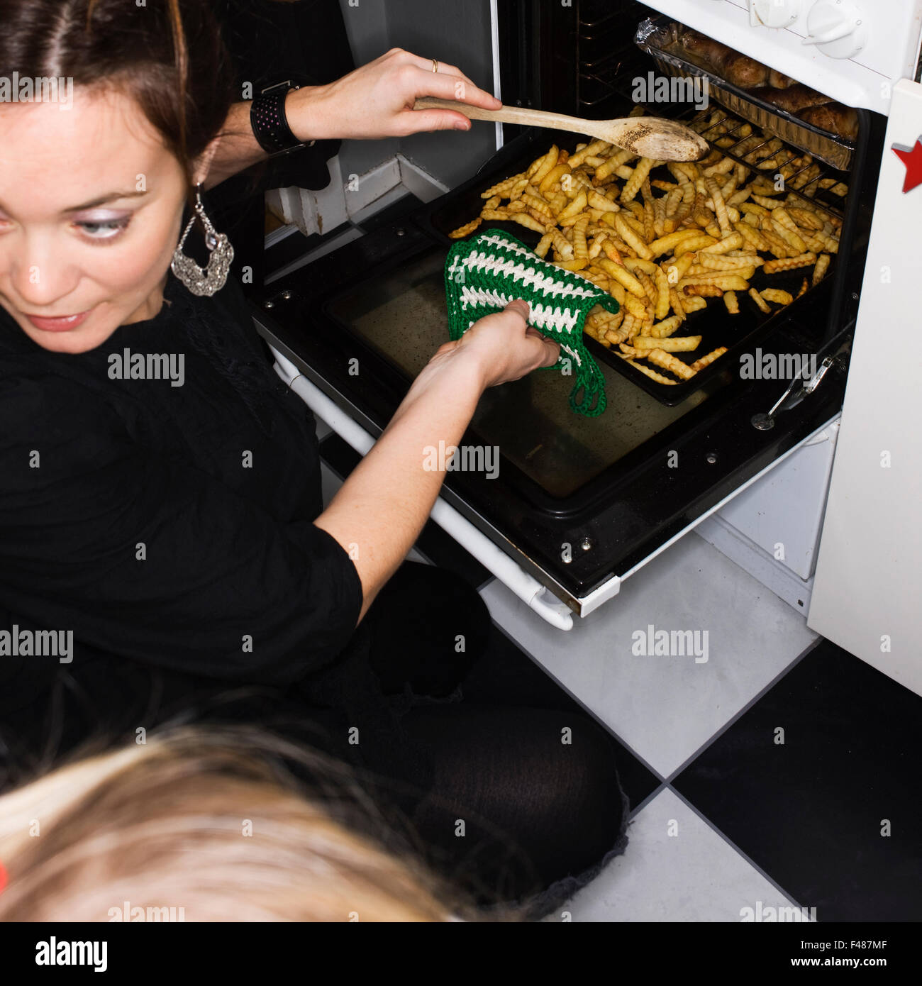 Woman making french fries, Sweden Stock Photo - Alamy
