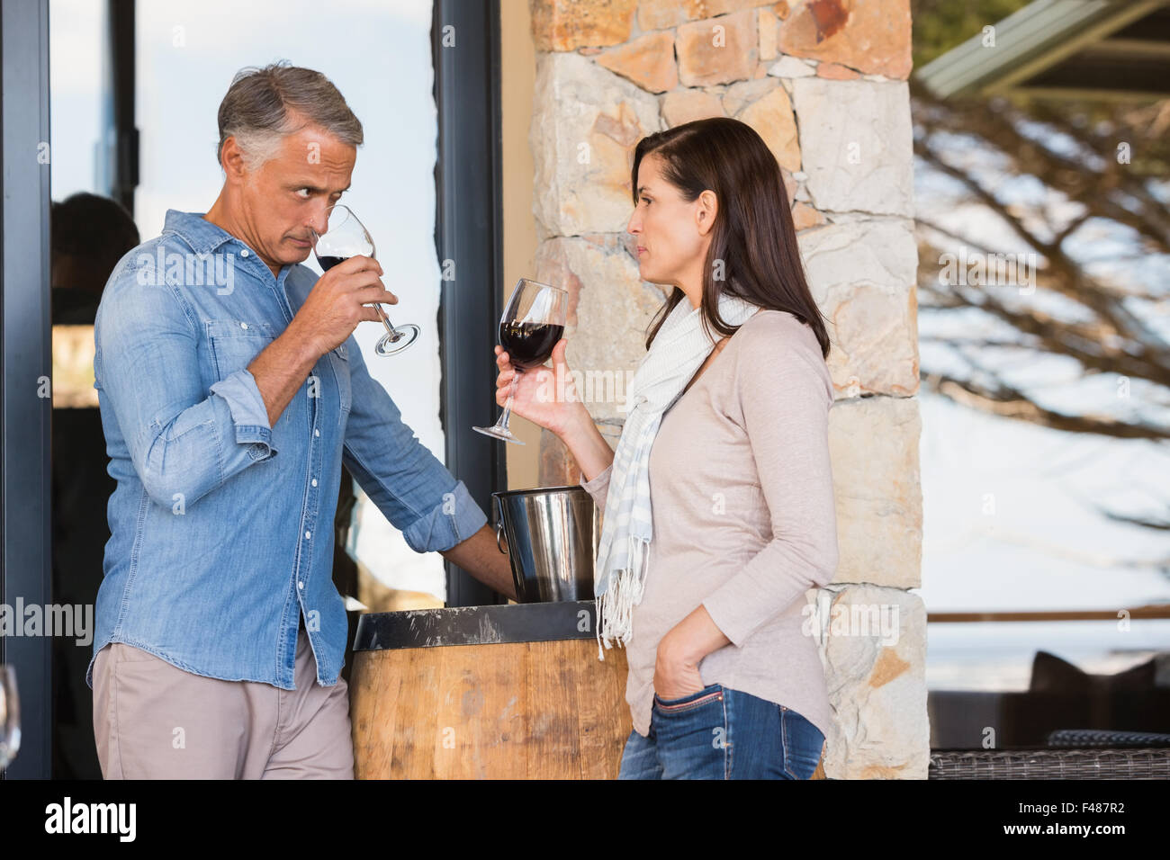 Two friends tasting a new wine Stock Photo - Alamy