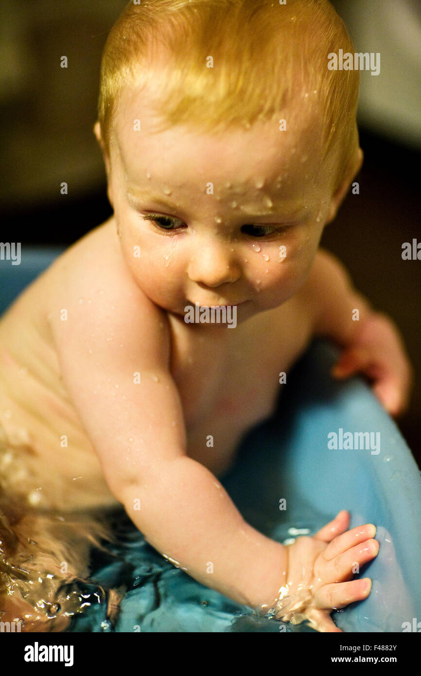 A baby boy bathing, Sweden Stock Photo - Alamy