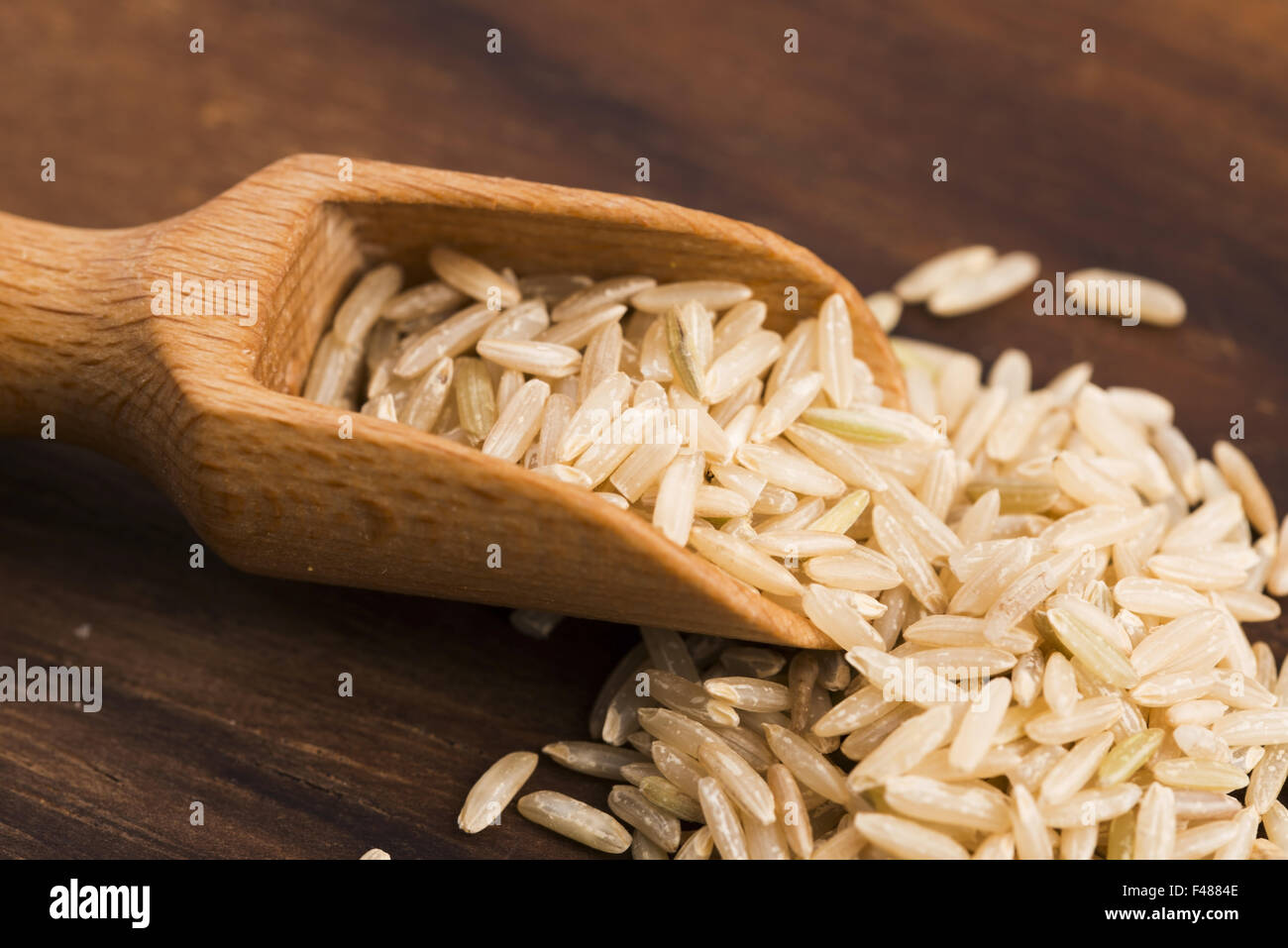 Spoon of brown rice close up Stock Photo - Alamy