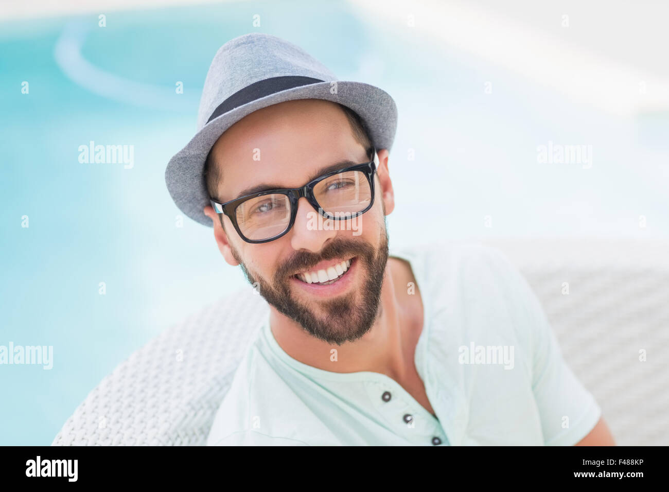 Happy handsome man looking at camera Stock Photo - Alamy