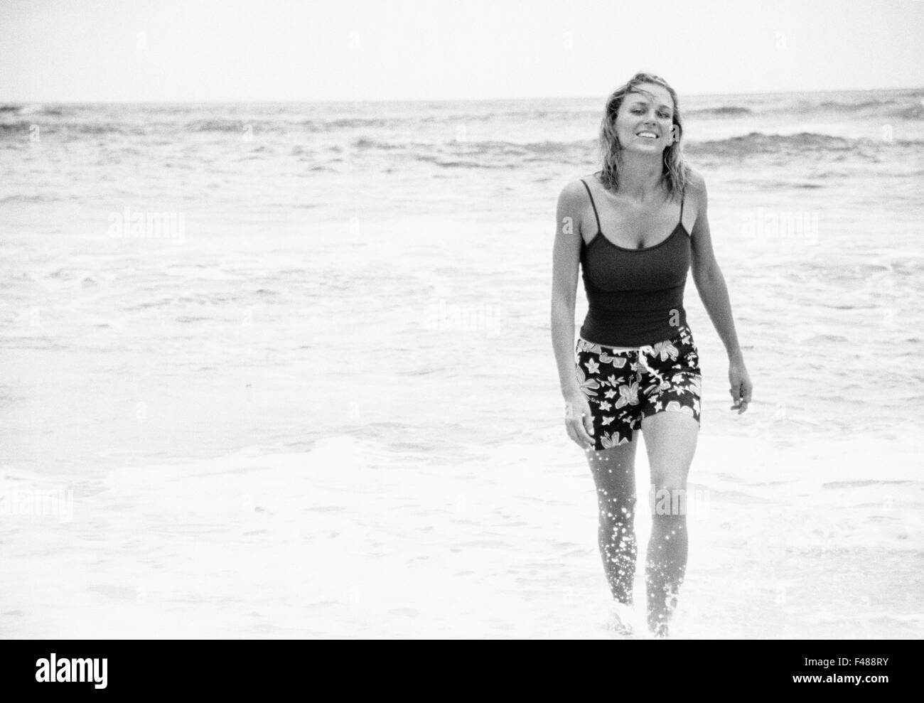 Female model on a beach, Bali Stock Photo - Alamy
