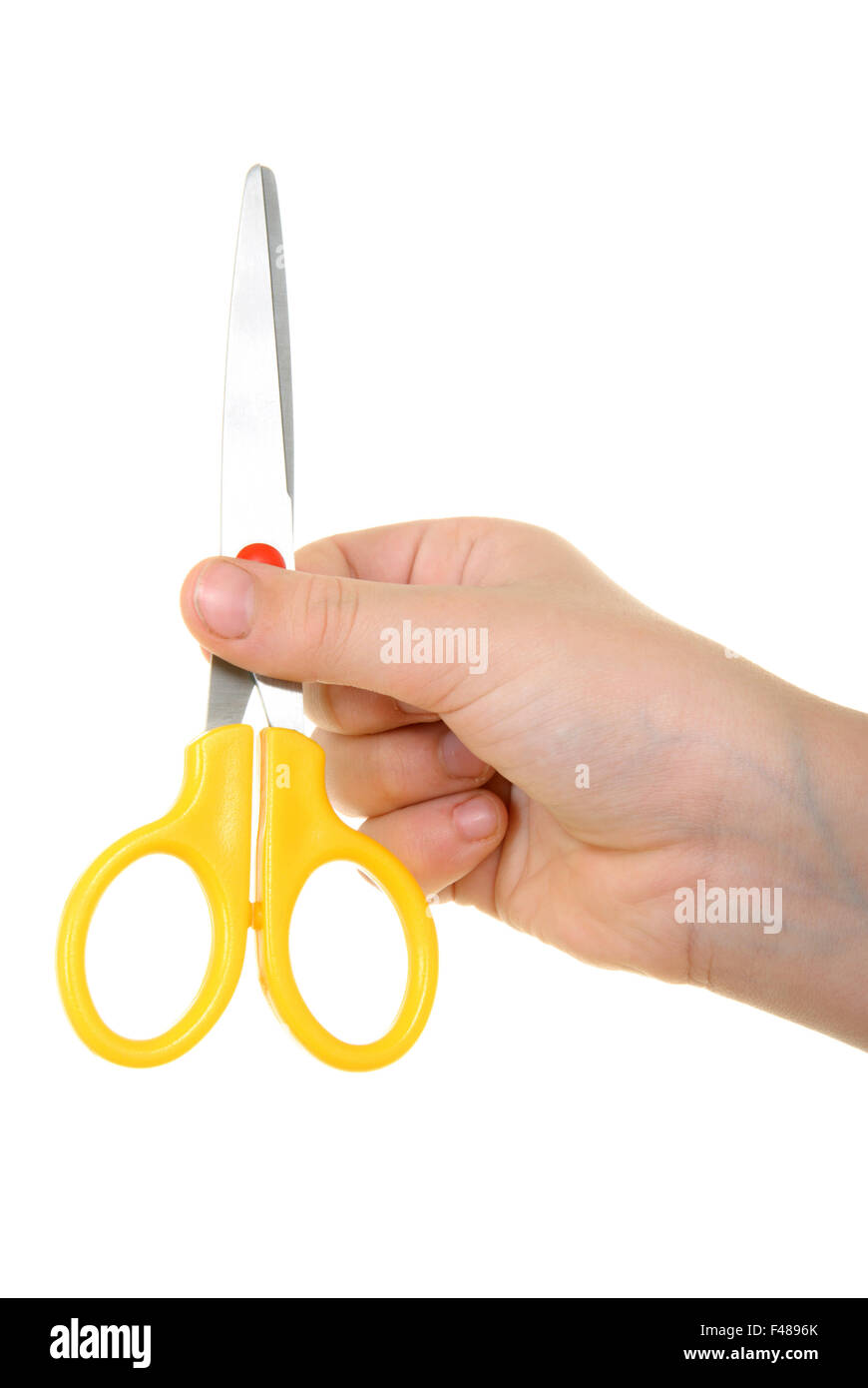 Scissors in hand Stock Photo - Alamy