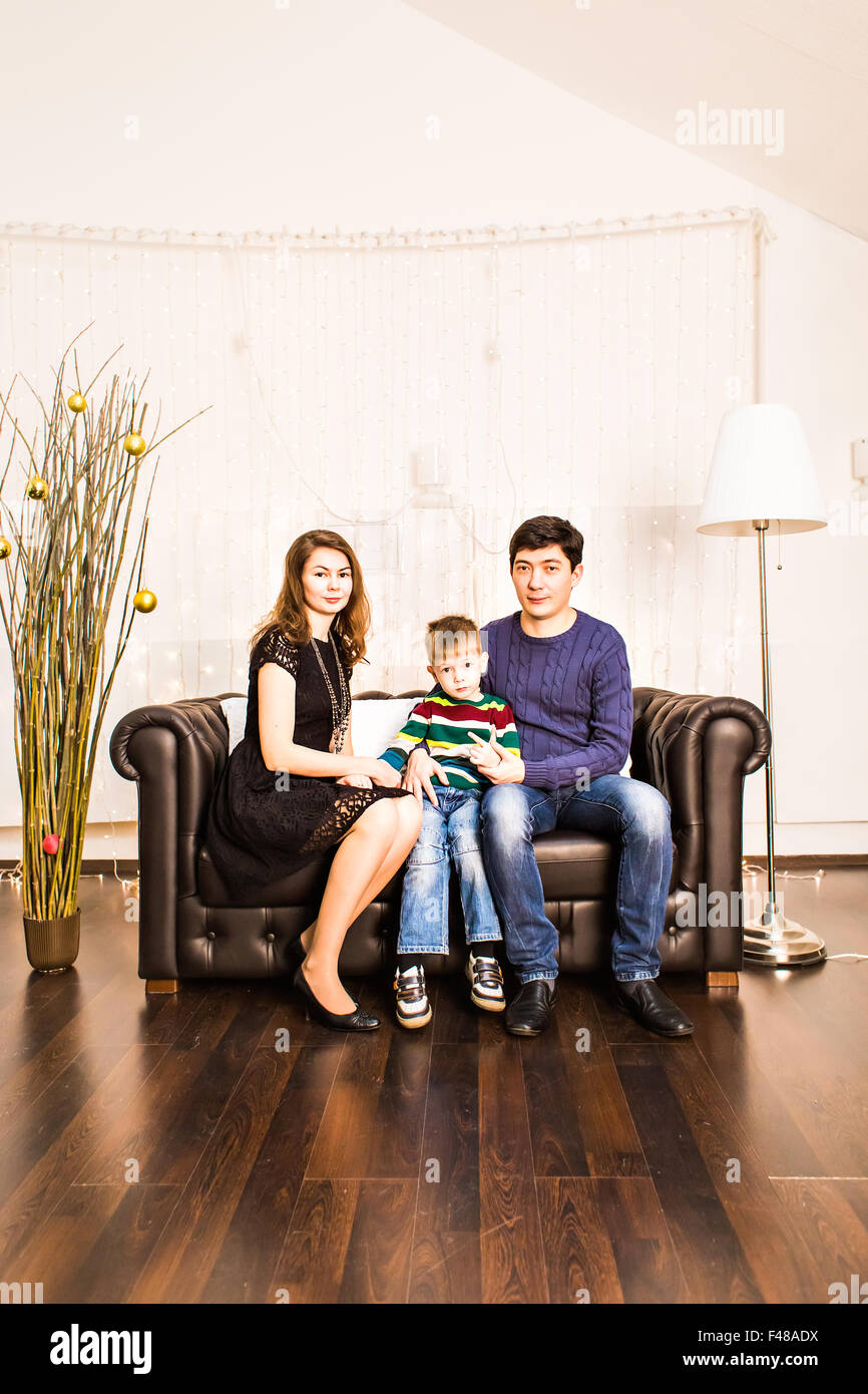 Portrait of a happy family smiling at home Stock Photo - Alamy