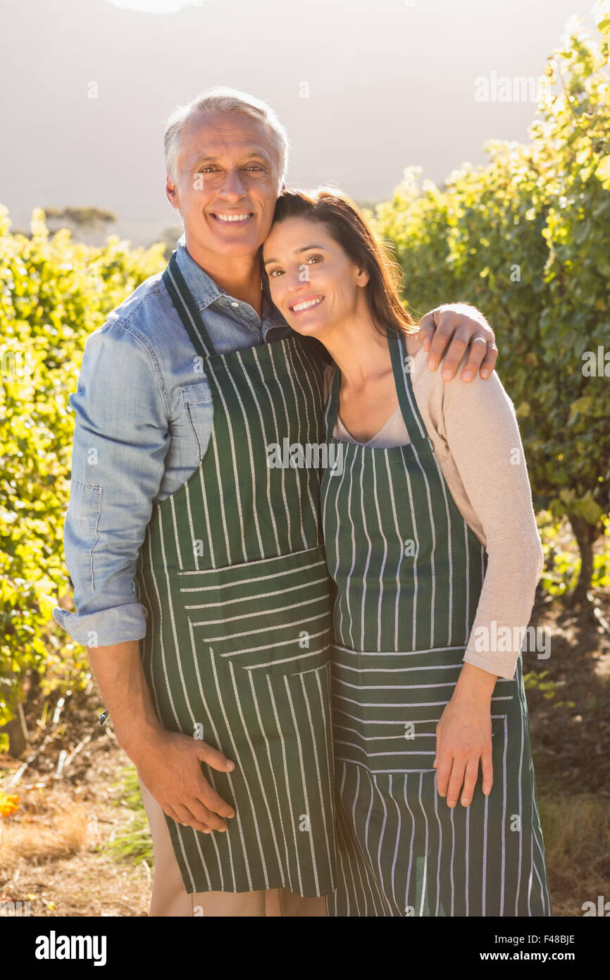 Putting arms around hi-res stock photography and images - Alamy