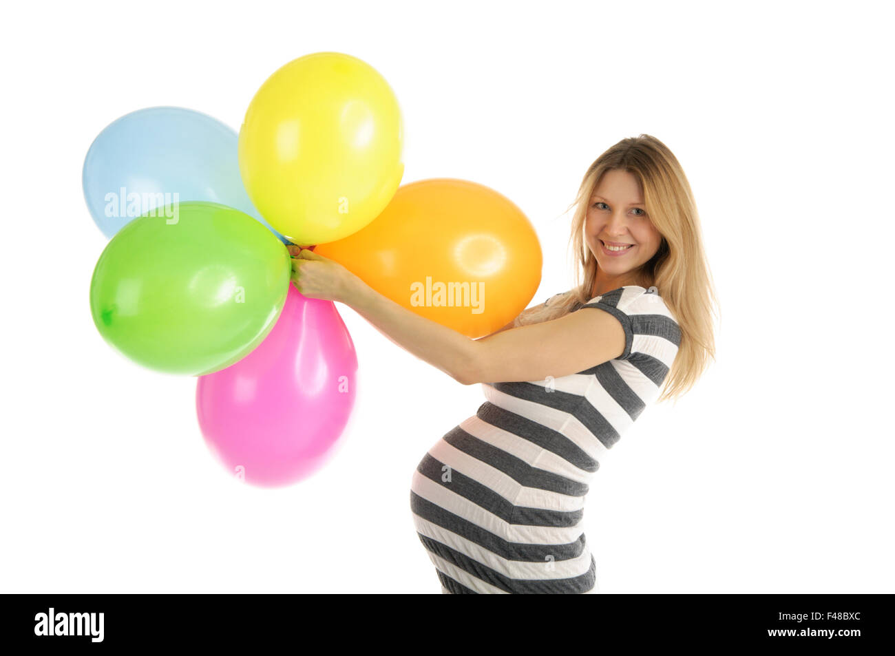 pregnant woman with balloons Stock Photo - Alamy