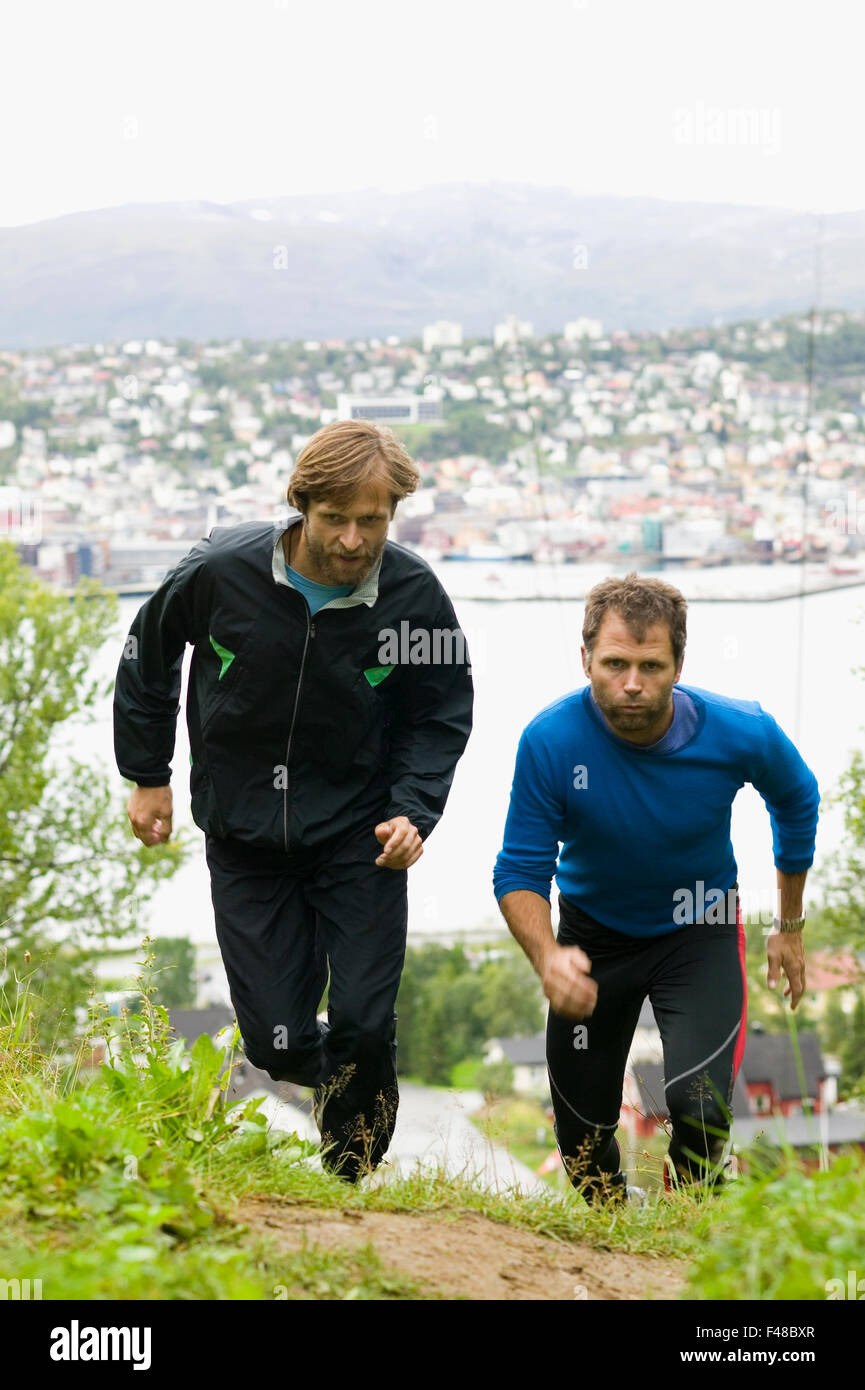 Two men running, Norway Stock Photo - Alamy