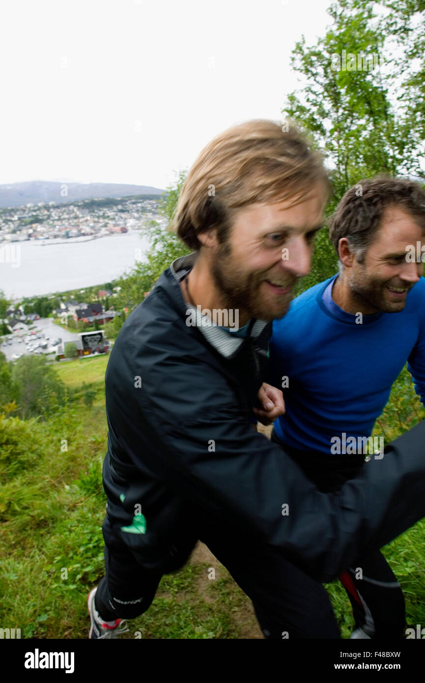 Two men running, Norway Stock Photo - Alamy