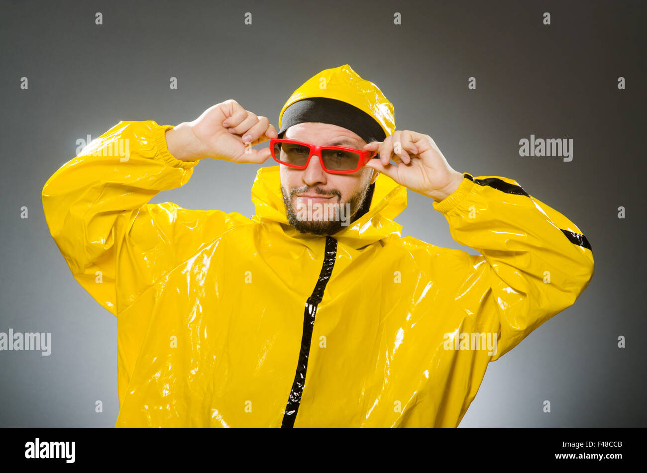 Funny man wearing yellow suit Stock Photo - Alamy