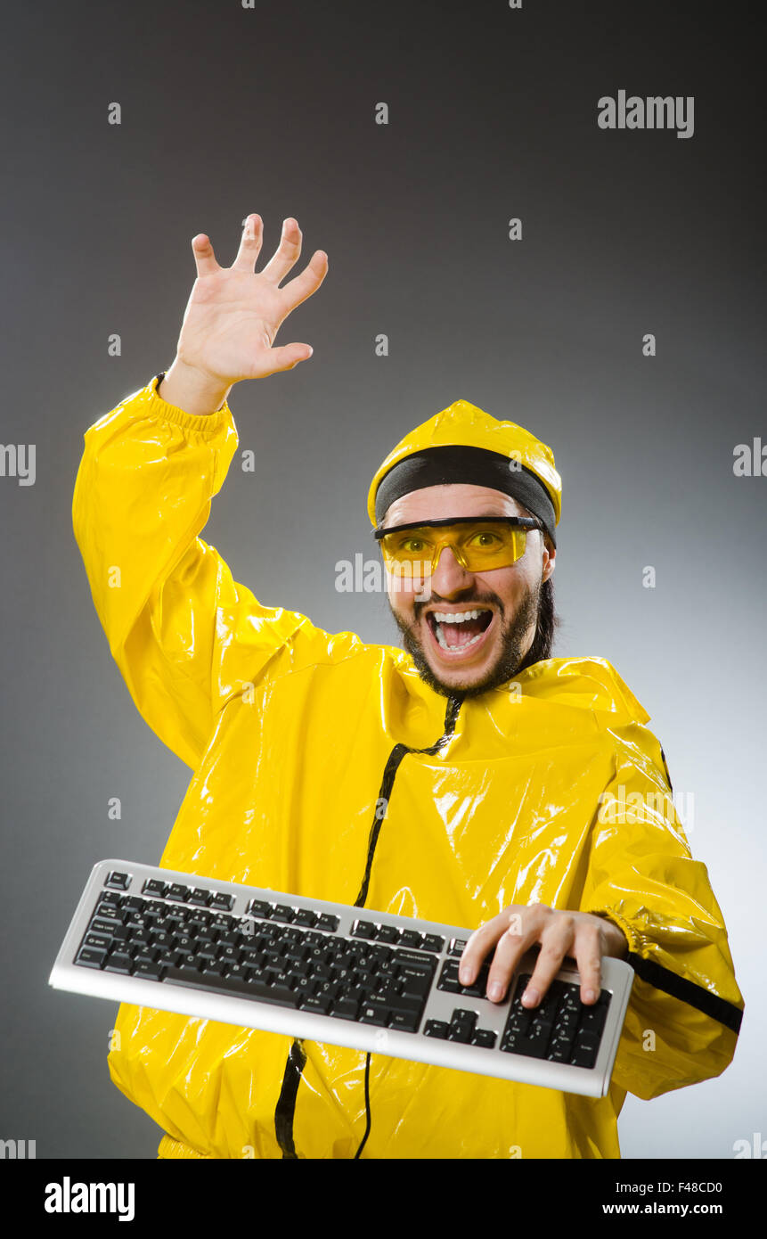 Man wearing yellow suit with keyboard Stock Photo - Alamy