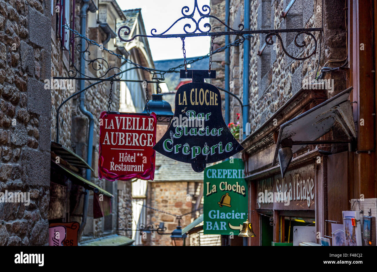 France, Normandy, signs of store and restaurants for tourists in the ...