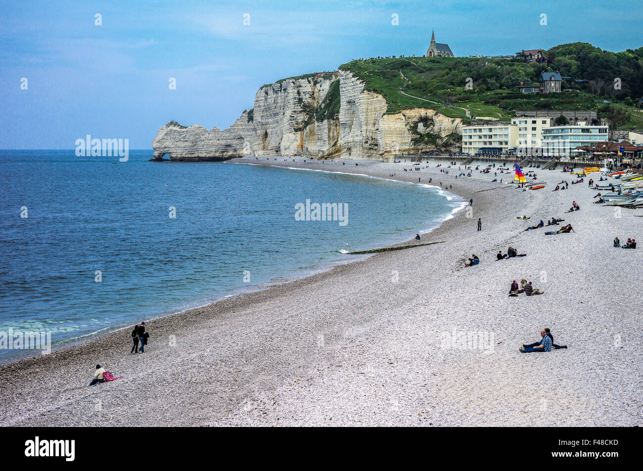 France, Normandy, people in the beach with cliffs of Etretat Stock ...