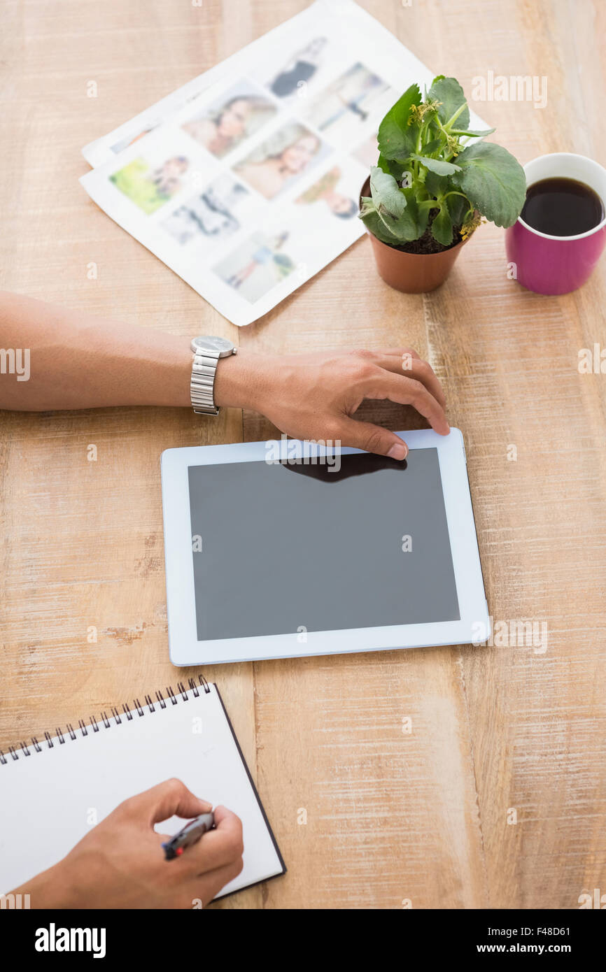 Casual businessman taking notes Stock Photo - Alamy