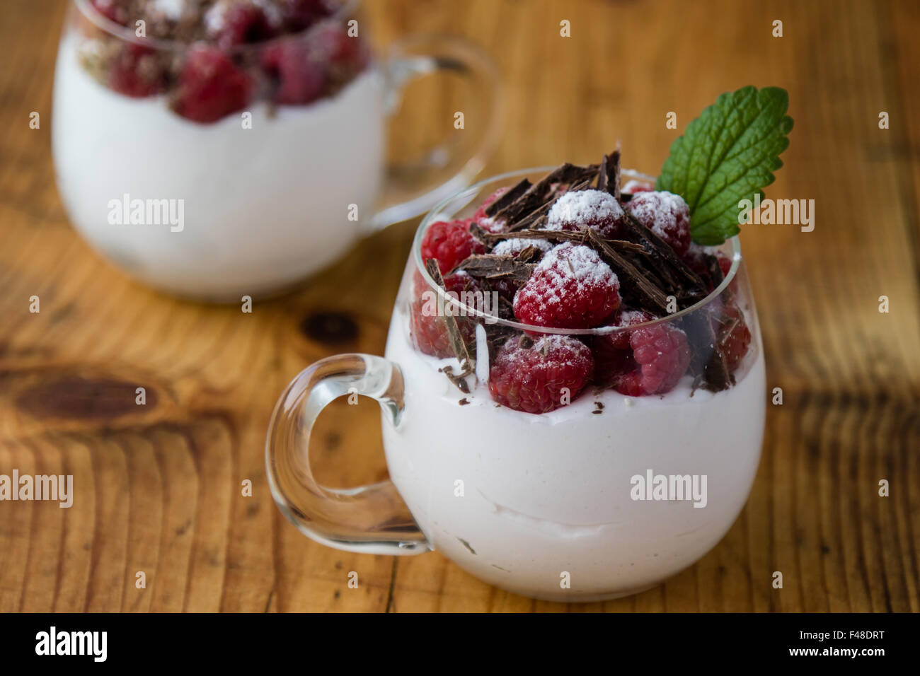raspberry with whipped cream Stock Photo - Alamy
