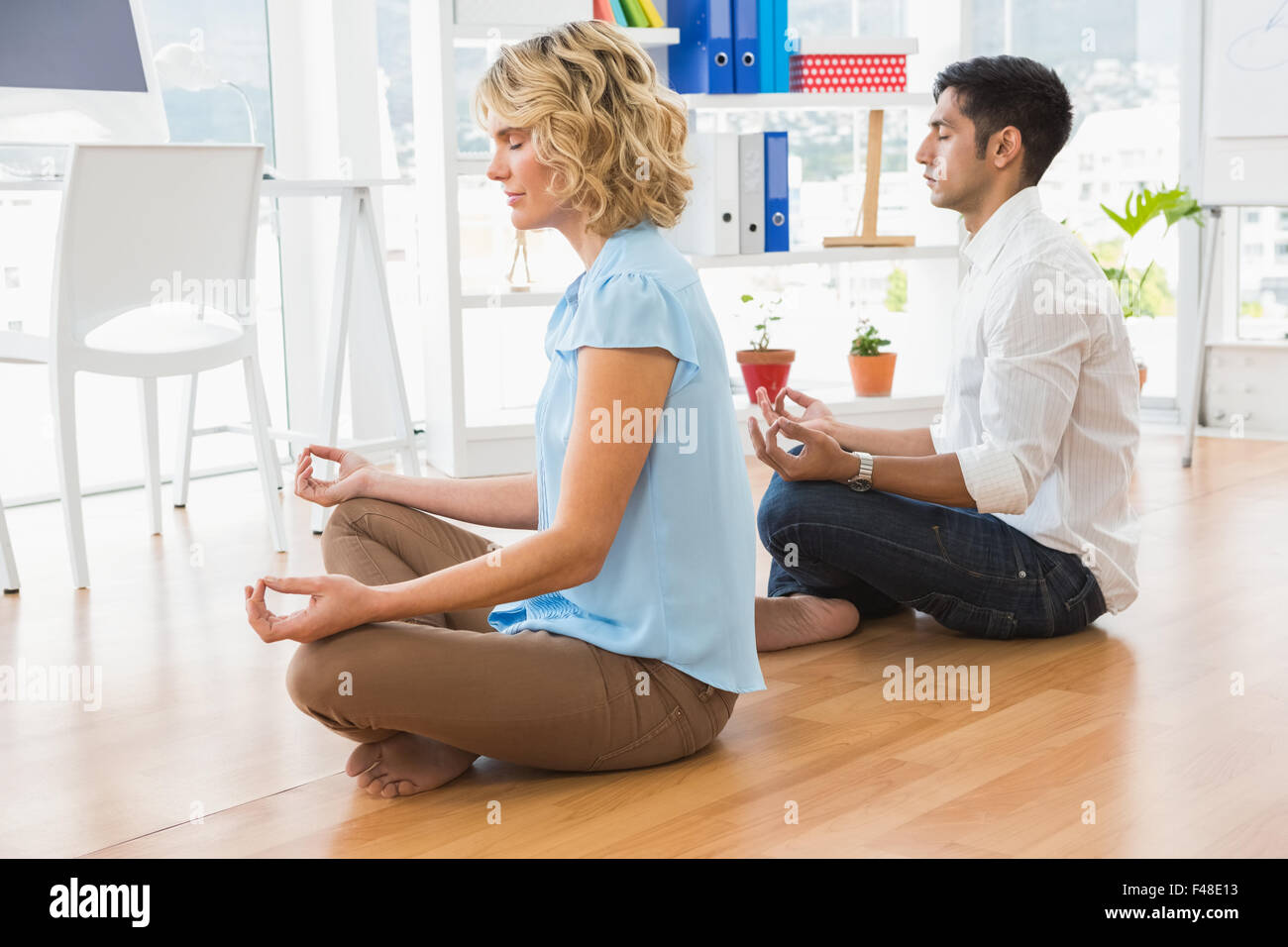 Young business people mediating Stock Photo - Alamy