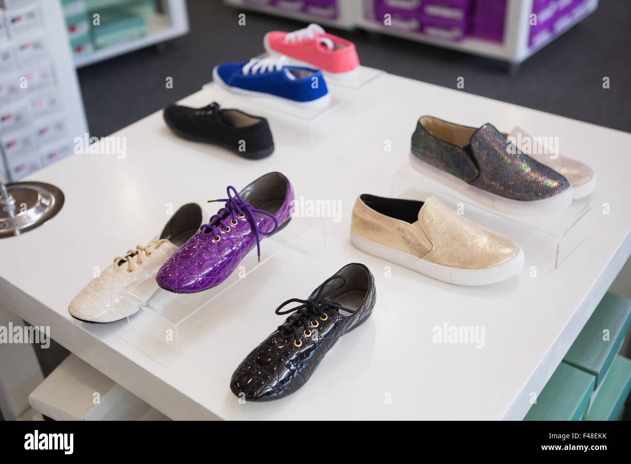 Different shoes on display Stock Photo - Alamy