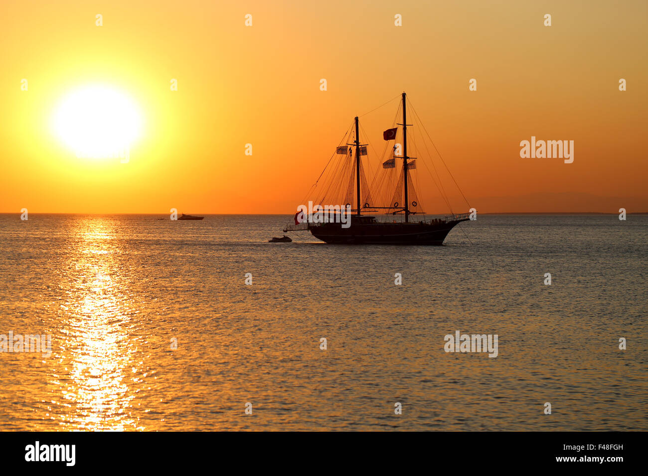 gorgeous very beautiful sunset over the sea with the ship Stock Photo ...