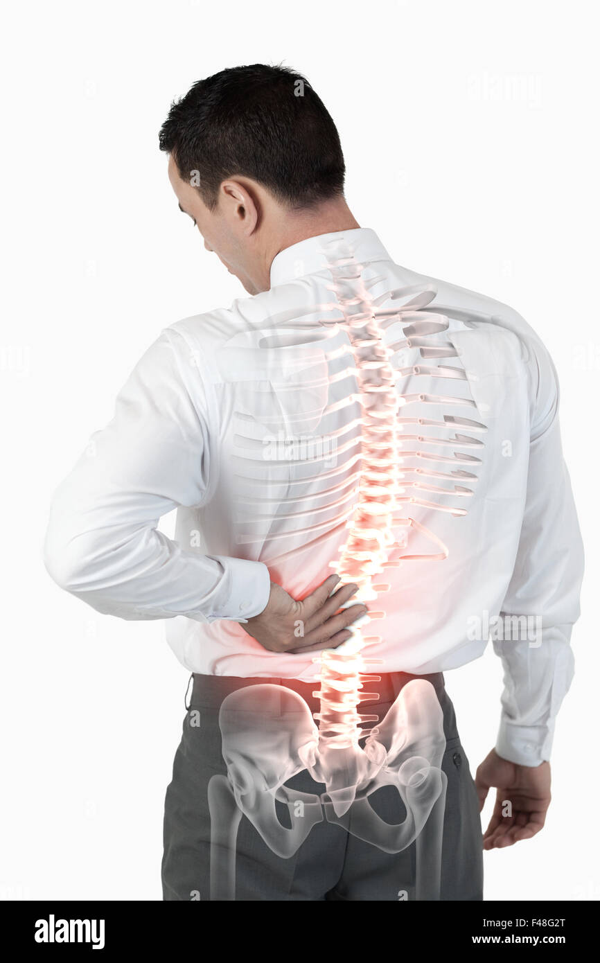 Highlighted spine of man with back pain Stock Photo - Alamy