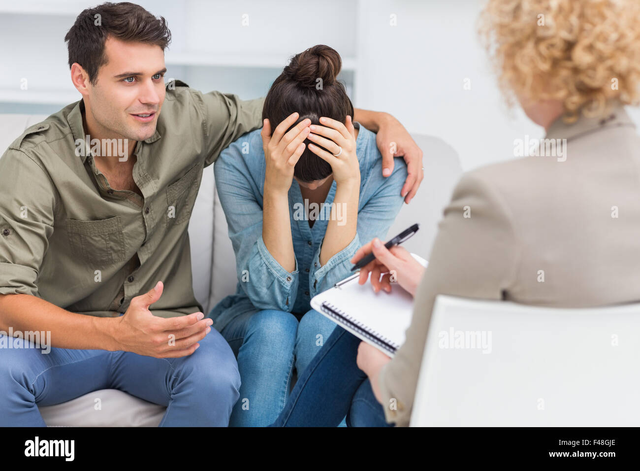 Psychologist helping a couple with relationship difficulties Stock ...