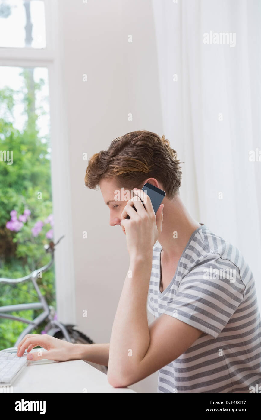 Handsome man having phone call Stock Photo - Alamy