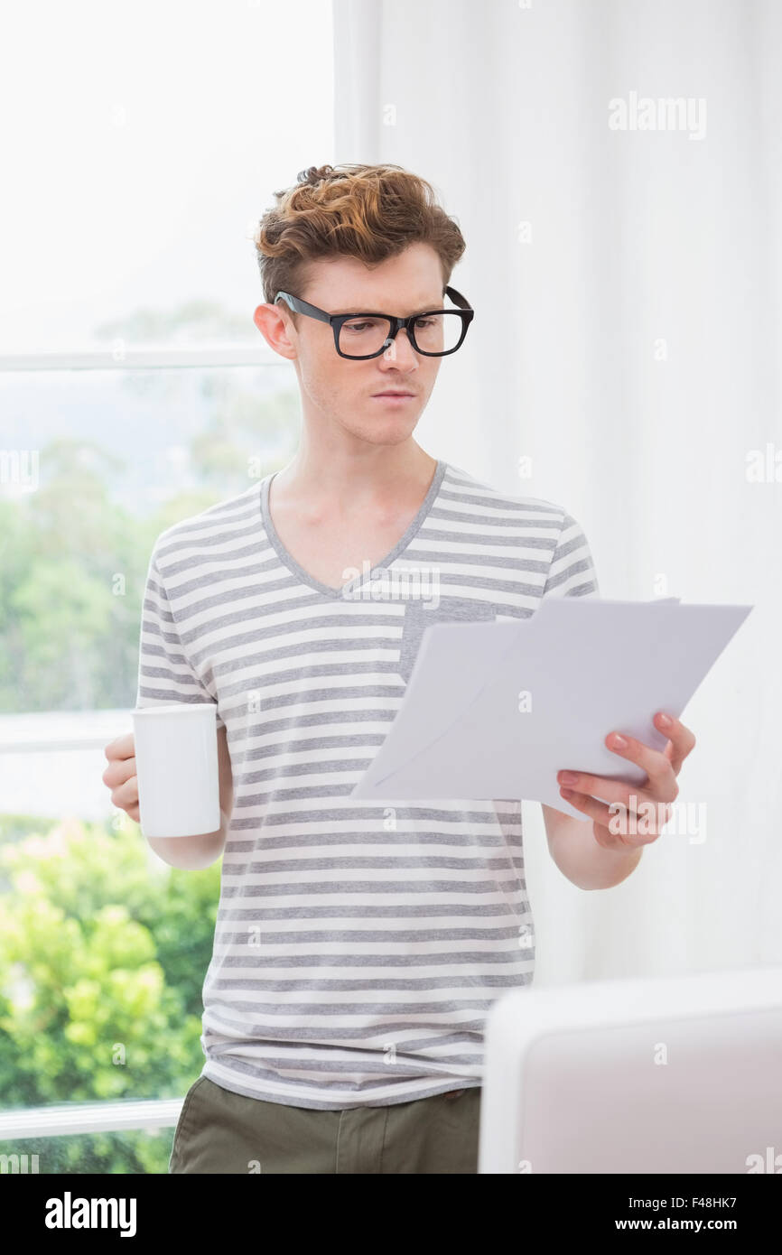 Man reading paper hi-res stock photography and images - Alamy