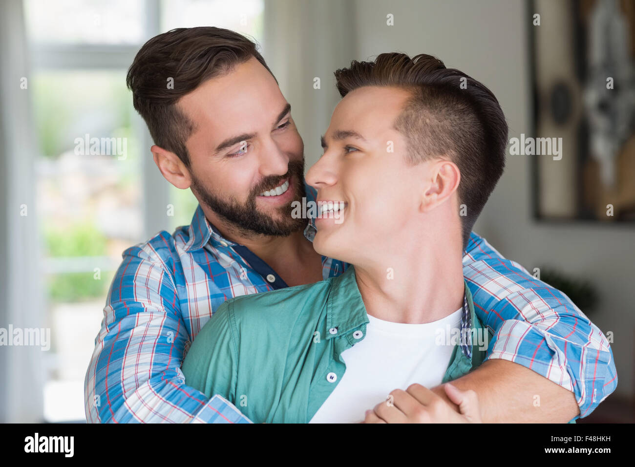 Homosexual couple men looking each other Stock Photo - Alamy