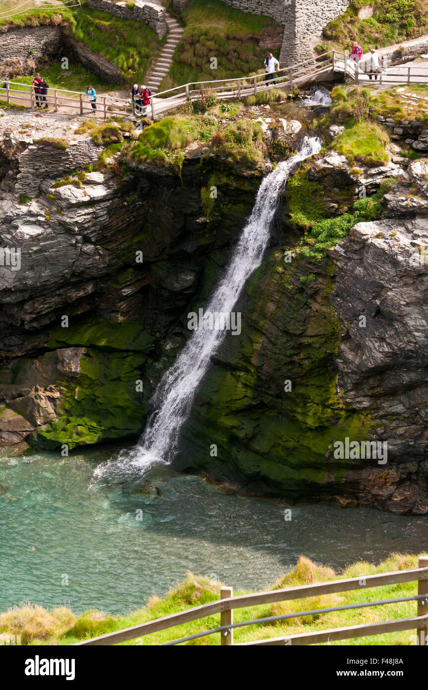 Waterfall In The Ruins Of Tintagel castle Cornwall England UK Stock ...