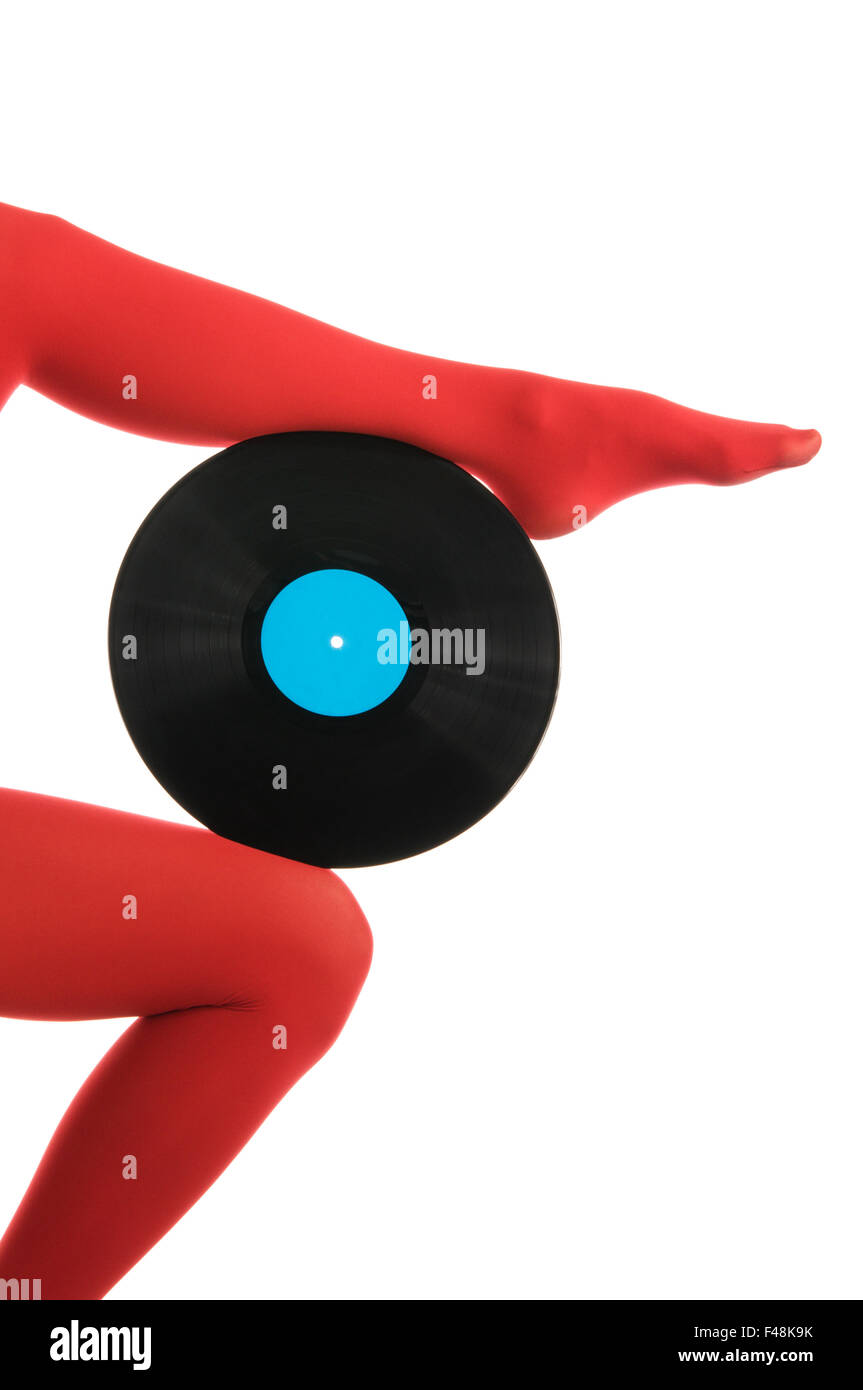 Female feet with vinyl record Stock Photo - Alamy