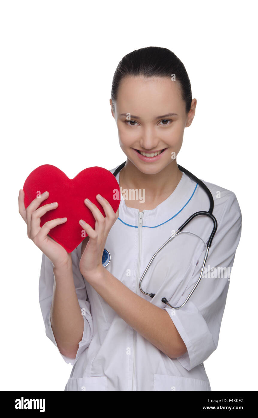 Smiling doctor holding a red heart Stock Photo - Alamy Smiling doctor holding a red heart Stock Photo - Alamy