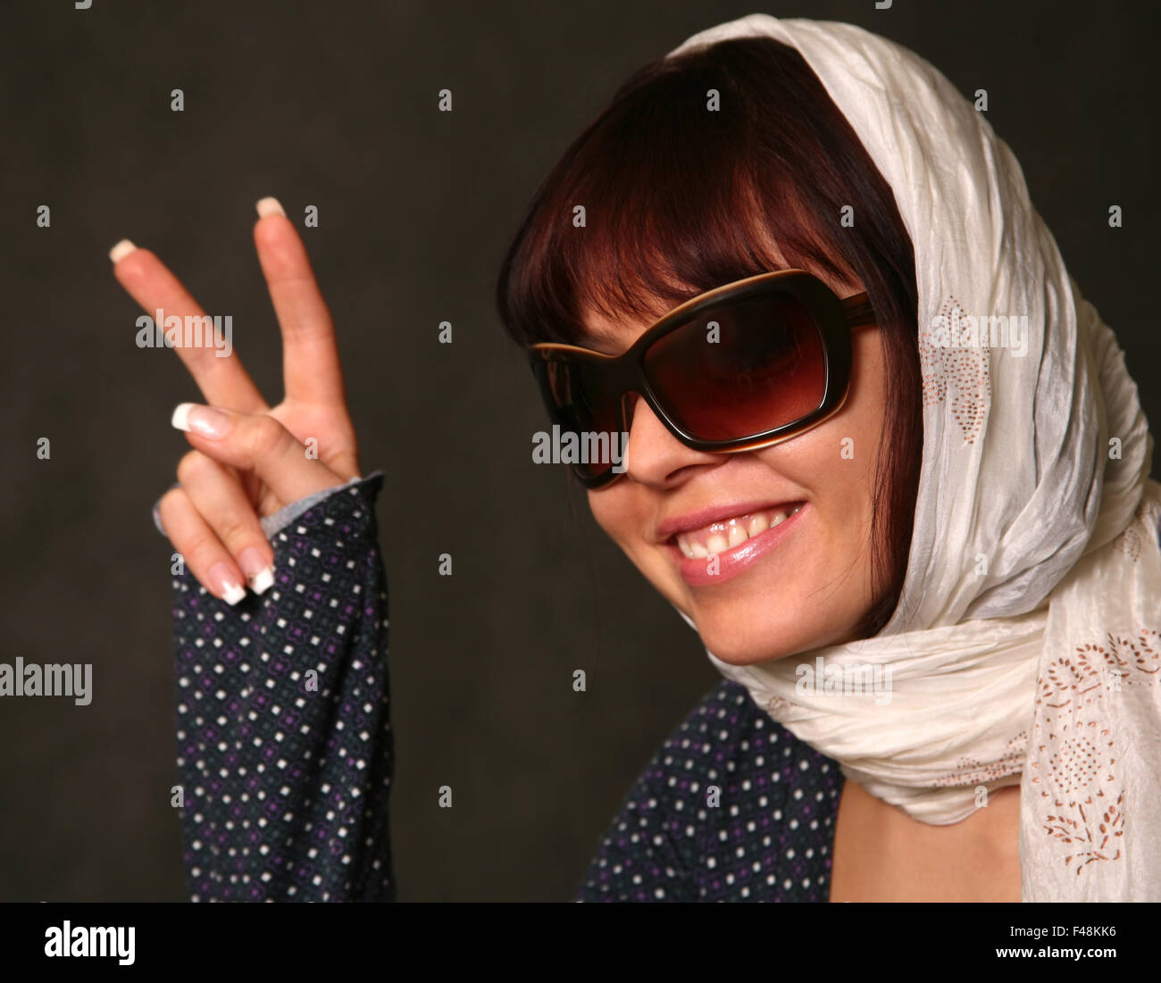 Gesture a victory Stock Photo - Alamy
