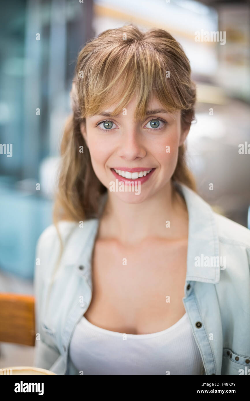 Beautiful woman smiling at the camera Stock Photo - Alamy