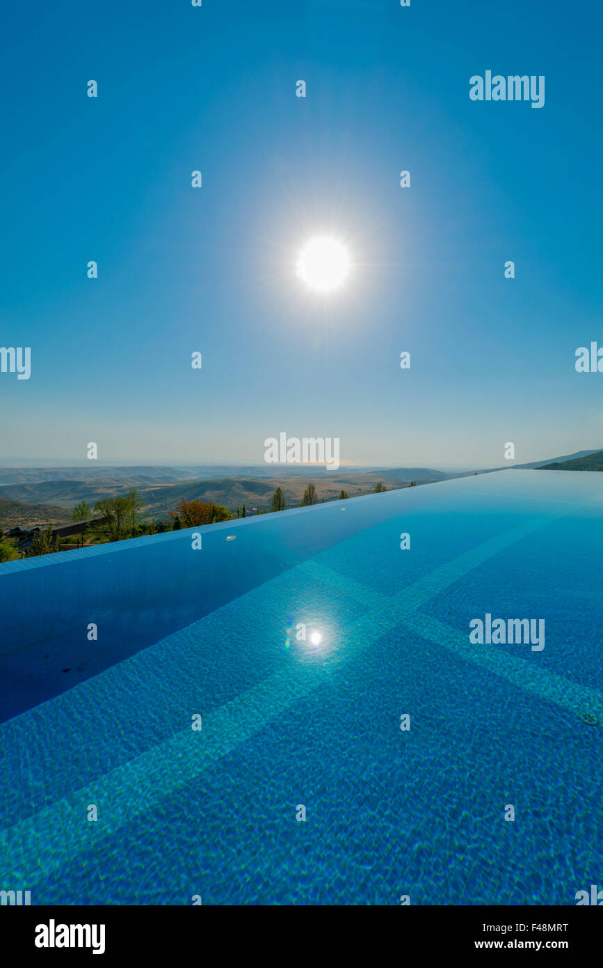 Infinity pool on the bright summer day Stock Photo - Alamy