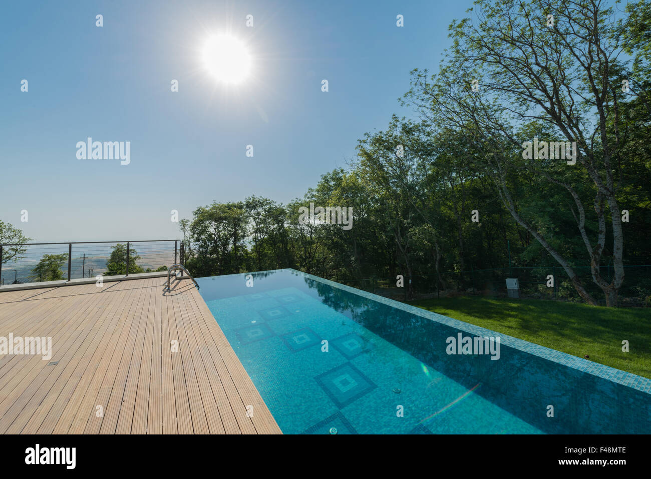 Infinity pool on the bright summer day Stock Photo - Alamy