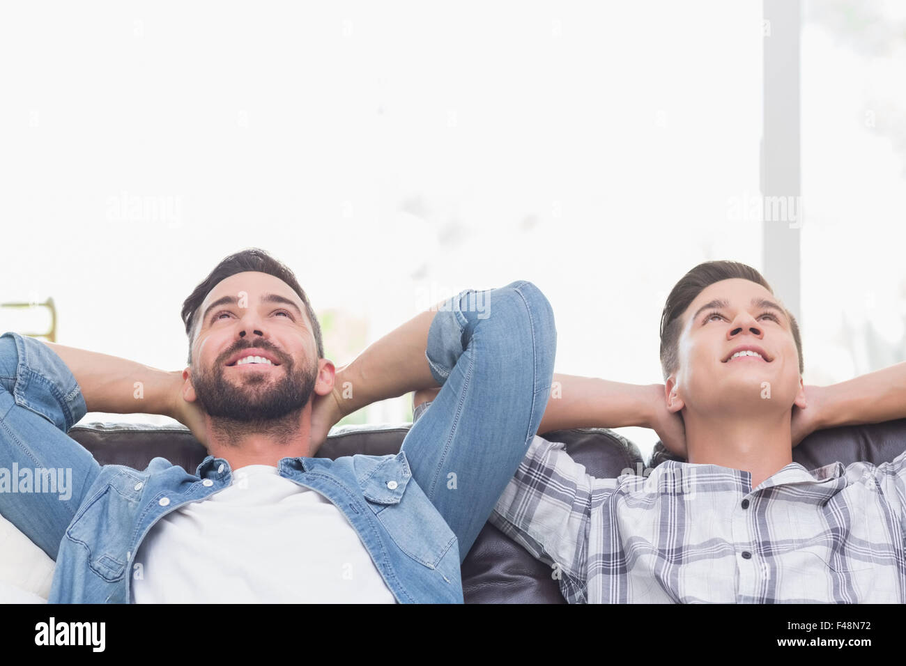 Gay lifestyle men relaxing together hi-res stock photography and images ...