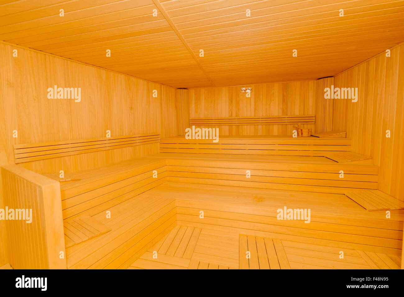 Hot wooden sauna room interior Stock Photo - Alamy